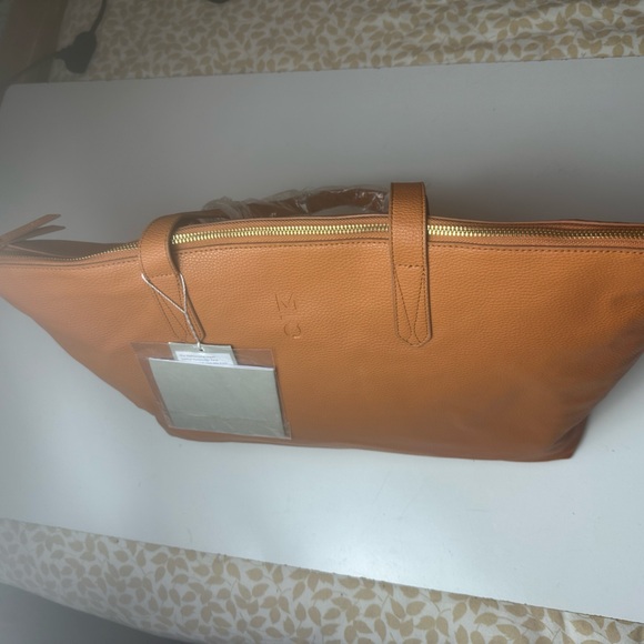 Motile | Bags | Motile Carmel Vegan Leather Wireless Battery System ...